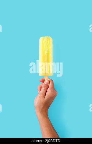 Hand holding strawberry dessert on a biscuit with jam Stock Photo - Alamy