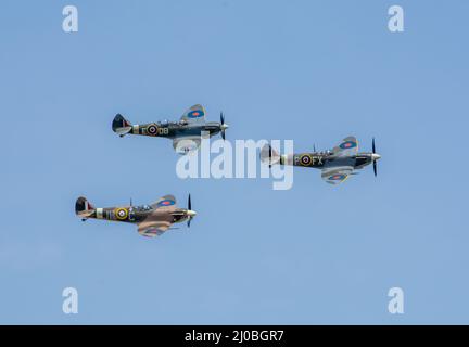 Spitfire dogfight. Formation of WW2 fighter planes in tight formation ...