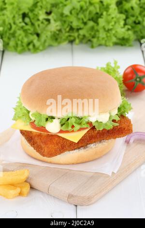 Fish burger baked fish hamburger fresh cheese tomato salad Stock Photo ...