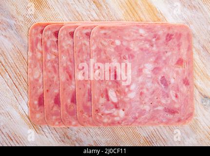 Slicing chopped ham from pork meat, no people Stock Photo - Alamy