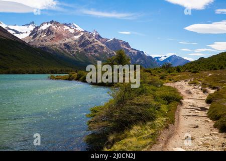 River in valley at foot of Andes mountains Stock Photo - Alamy