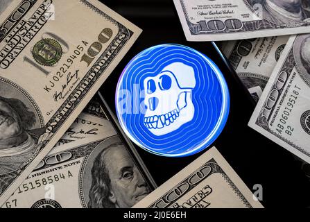 ApeCoin crypto token logo seen on the smartphone which is placed on ...