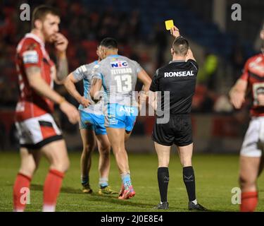 Referee Jack Smith shows Zane Tetevano #13 of Leeds Rhinos a yellow ...