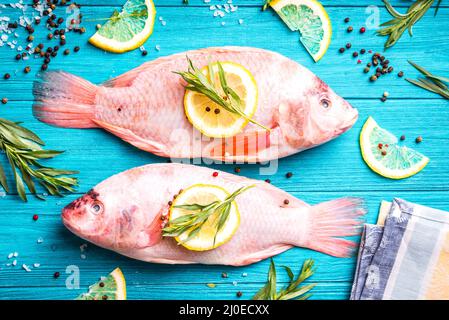 Fresh fish Tilapia Concept healthy eating with red heart shaped dish ...