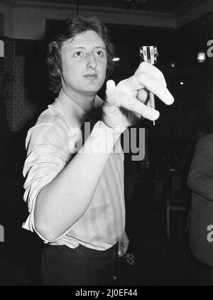 British dart player Eric Bristow pictured at the pub, serving drinks ...
