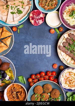 Middle eastern, arabic dishes with falafel, hummus, pita. Halal food ...