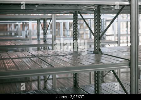 Empty warehouse racks Stock Photo - Alamy