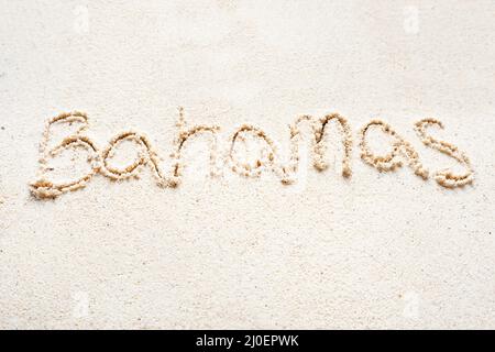 Handwriting words "Bahamas" on sand of beach Stock Photo - Alamy