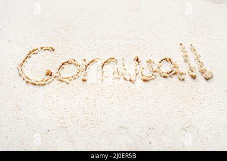 Handwriting words "Cornwall" on sand of beach Stock Photo - Alamy