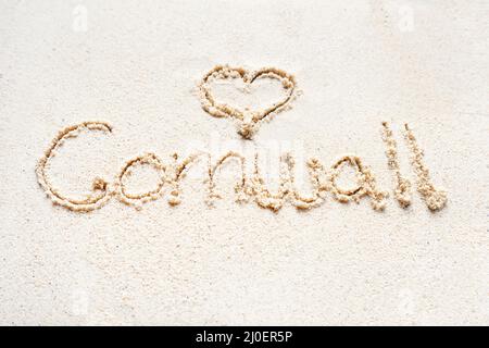 Handwriting words "Cornwall" on sand of beach Stock Photo - Alamy