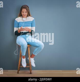 So much to choose from. An attractive young woman holding a bunch of ...