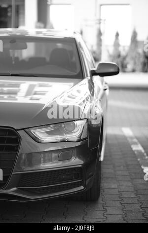 A grayscale closeup detail shot of a car wheel GCR brand Stock Photo ...