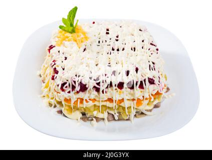 Dressed herring on the plate. Isolated over white background Stock ...