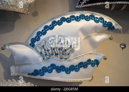Making fool's caps for the carnival Stock Photo - Alamy