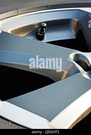 A close-up shot of a rim detail of the powerful BMW M4 car Stock Photo ...