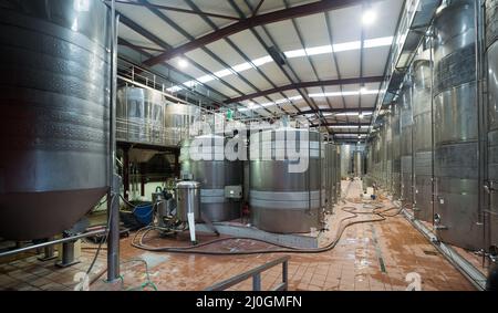 Modern winery with stell barrels Stock Photo - Alamy