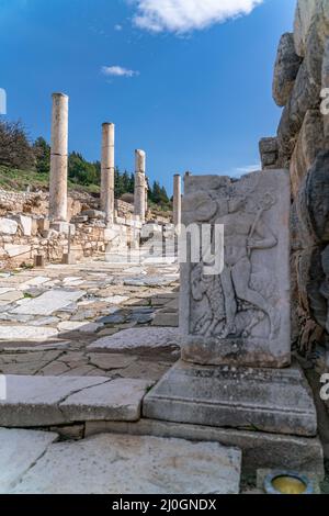 Stone construction with carved image of Virgin Lourdes in a Christian ...