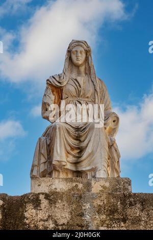 This statue represents Ceres, the Roman goddess of agriculture. The ...