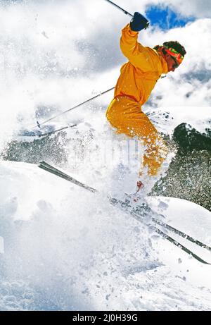 Side view of a person ski jumping Stock Photo - Alamy