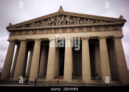 Full scale replica of Athena Parthenos statue holding statue of goddess Nike inside Parthenon in ...