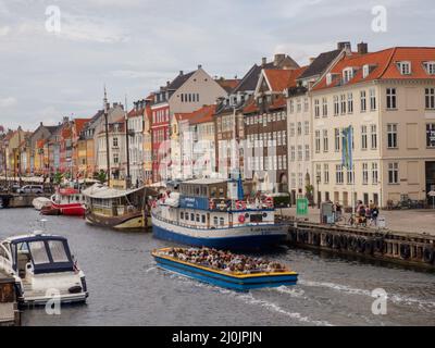 Copenhagen, Denmark - July 2021: View of Nyhavn buildings with plenty ...