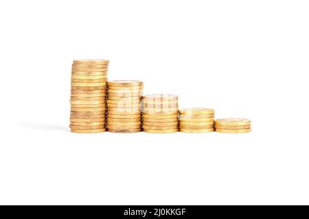 Stacks of coins of different heights isolated on a white background ...