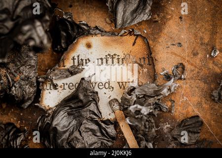 Old burned paperwork surrounded by burnt paper ashes Stock Photo - Alamy
