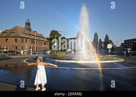 Monheim Geyser in the roundabout with rainbow, Monheim am Rhein ...