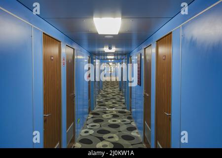 Corridor with cabins for passengers inside the cruise ship Stock Photo ...