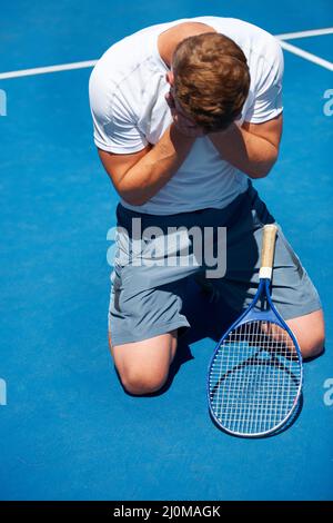 Frustrated tennis player man after fail on tennis court Stock Photo - Alamy