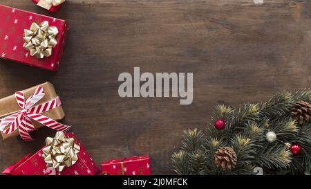 Gift boxes with green fir tree branches Stock Photo - Alamy
