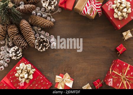 Gift boxes with big cones table Stock Photo - Alamy