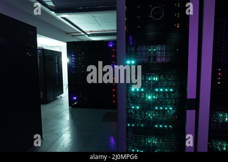 Data center with multiple rows of fully operational server racks Stock ...