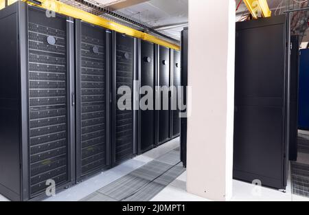 Data center with multiple rows of fully operational server racks Stock Photo - Alamy