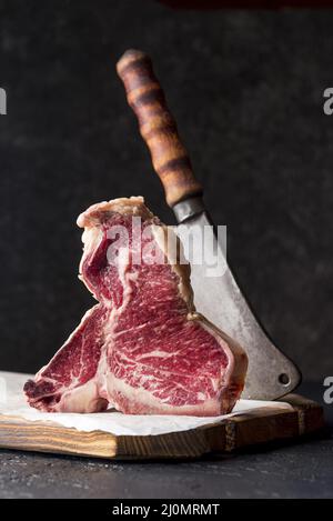 butcher cutter with meat cleaver cutting Stock Photo - Alamy