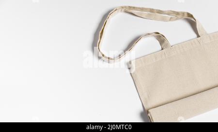folded fabric tote bag flat lay. High quality and resolution beautiful ...