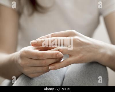 Female removing marriage ring Stock Photo - Alamy