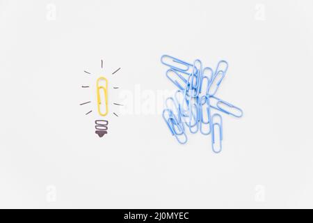 Light bulb with drawing on yellow background. Business idea concept ...