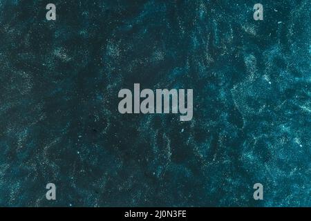 Azure blue paint diffusing with water, water surface, background image ...