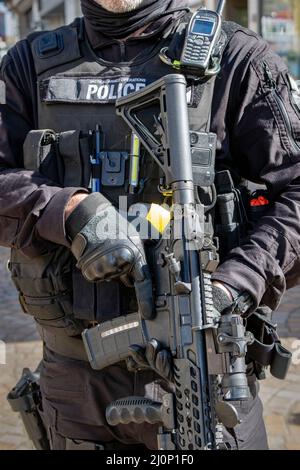 Uniformed Armed British Police, authorised firearms officer (AFO) a ...