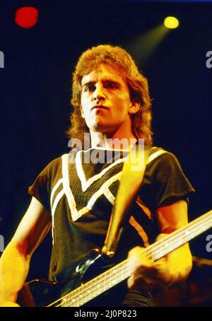 Canadian rock band Saga in concert at Hammersmith Odeon. Guitarist Ian ...
