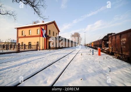 Closeup of a building with a snowy yard in the foreground Stock Photo ...