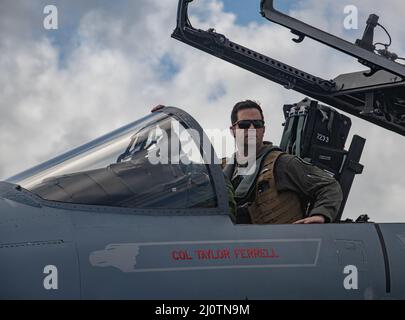 U.S. Air Force Col. Taylor Ferrell, left, 18th Operations Group ...