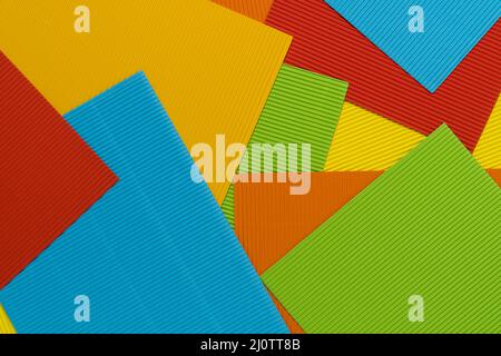 Striped colored embossed paper sheets with copy space. Colorful paper ...