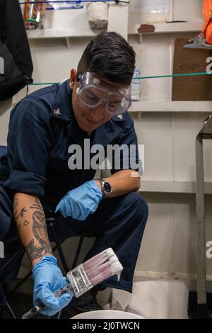 U.S. Navy Yeoman Third Class Alexandra Miller, right, from Annapolis ...