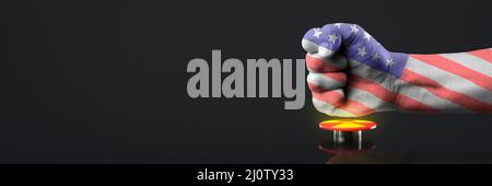 The hand presses the big red button. The concept of the threat of ...