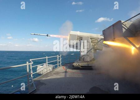 A RIM-116 Rolling Airframe Missile (RAM) is launched from the ...