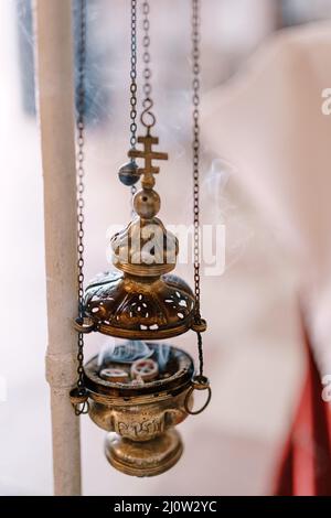 This ritual censer is a metal incense burner for religious ceremonies ...