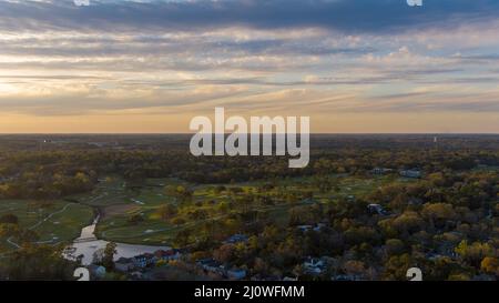 Aerial view of the Country Club of Mobile golf course at sunset in ...