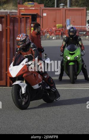 Classic racing sport motorbike running in the asphalt track Stock Photo ...